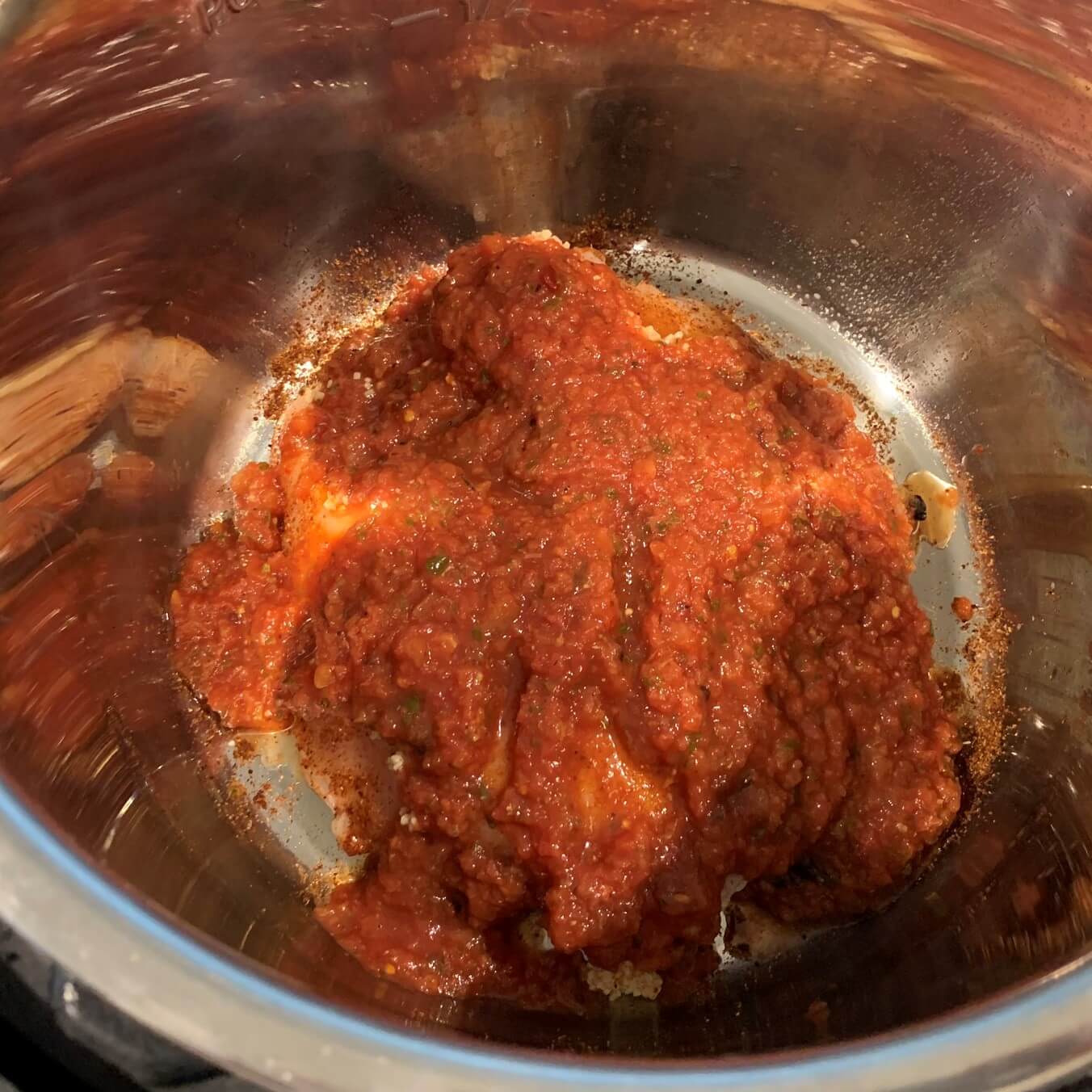 shredded chicken tacos cover with salsa